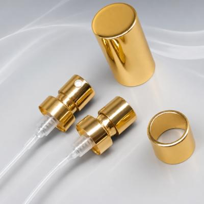 China Luxury Aluminum Perfume Spray Pump with 21mm Gold Decorative Cap for Premium Fragrance Packaging for sale