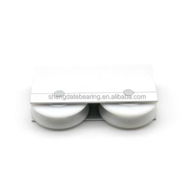 China Modern Round Groove Brass Roller Low Noise Sliding Door Window Pulley Hardware Set for sale