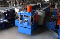 China PLC 1.2mm Steel Door Frame Roll Forming Machine 7.5kW Gearbox Drive for sale