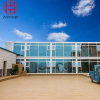 China Large Scale Glass Curtain Flat Pack Container House Modern Style Luxury Design for sale