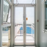 China Modern Luxury Quick Concrete Construction Flat Pack Container House Large Modular Prefab Glass House for sale