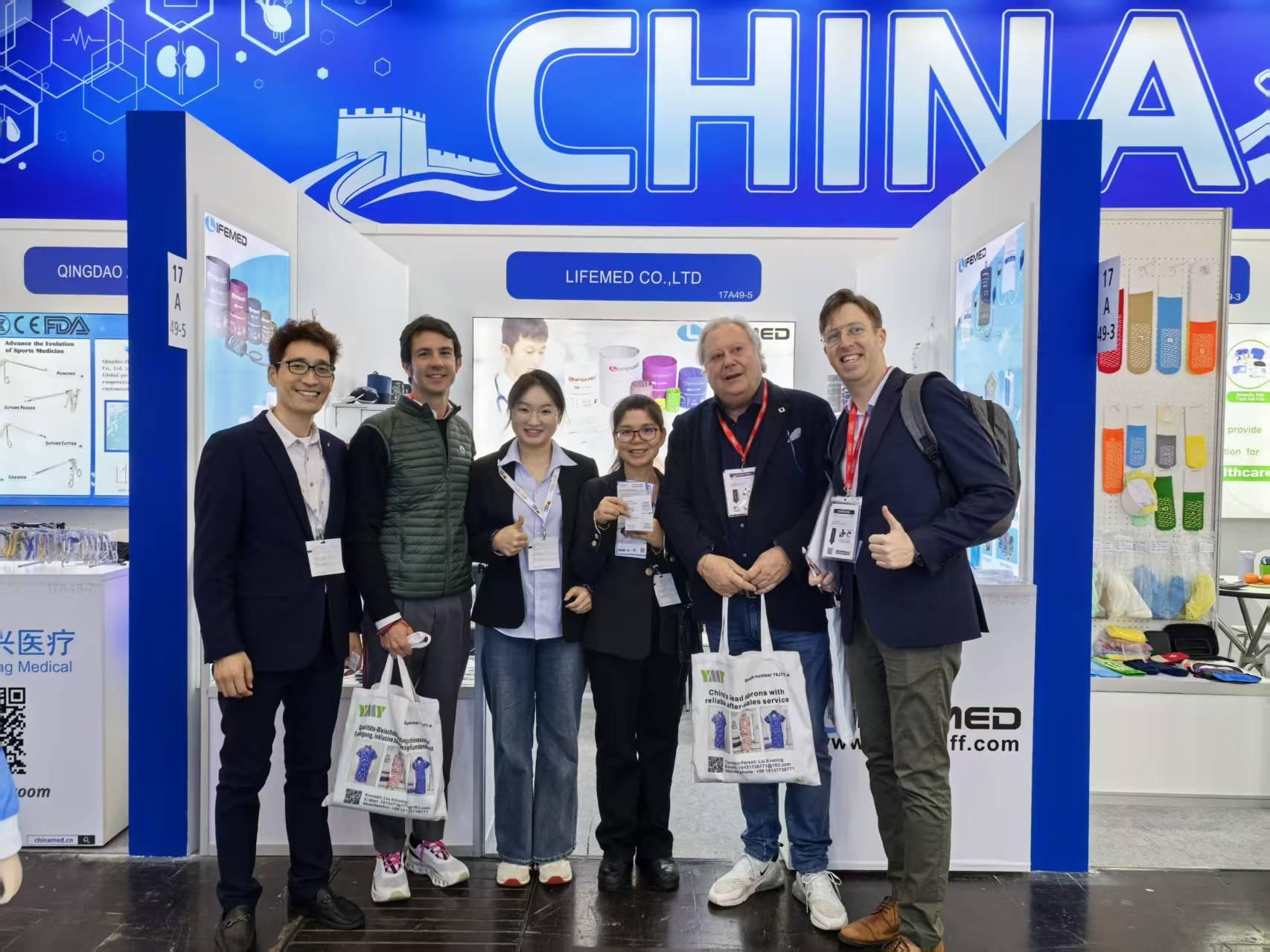Lifemed team with global clients at MEDICA 2025 booth 17A49-5
