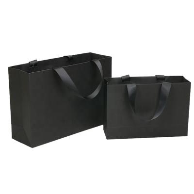 China Silk Ribbons Recycled Paper Gift Bags Black Card Eco Friendly For Clothes Shopping for sale