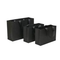 China Silk Ribbons Recycled Paper Gift Bags Black Card Eco Friendly For Clothes Shopping for sale