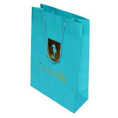 China Printed Blue Paper Bag Single Color Foil Stamping Logo Small Middle Large Hand Tie Rope Handle Jewelry Gift Packaging for sale