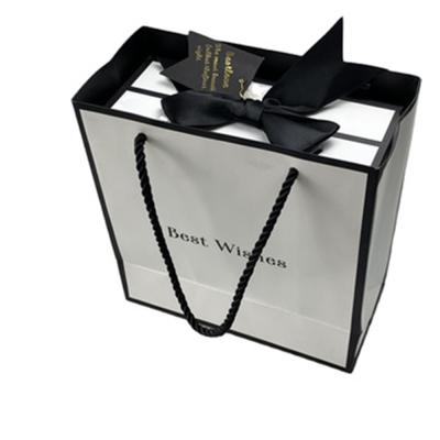 China Magnetic Closure Ribbon Paper Gift Packaging Box Without Insert for sale