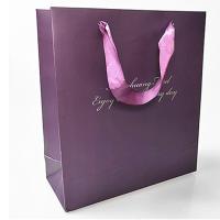 China Ribbon Handle Purple Paper Bag Silver Stamping Logo Bowknot Jewelry Gift Shopping Bag for sale