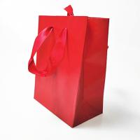 China Leather Paper Bright Red Small Gift Bag For Jewelry Shopping Custom Logo for sale