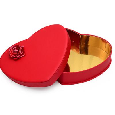 China Custom design chocolate storage box red heart shape coated paper packaging gold card interior for sale