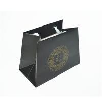 China Glossy Lamination Printed Paper Carrier Bags Black Gift Bags With Ribbon Handles for sale