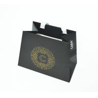 China Glossy Lamination Printed Paper Carrier Bags Black Gift Bags With Ribbon Handles for sale