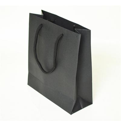 China Matte Black Custom Recycled Paper Gift Bags Personalized With Hook Rope for sale