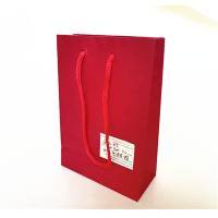 China Textured Handmade Recycled Paper Gift Bags Red Hot Stamping Logo For Jewelry for sale