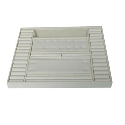 China Trapezoid Custom Jewelry Tray MDF White Leather Ring Tray Printing Logo for sale