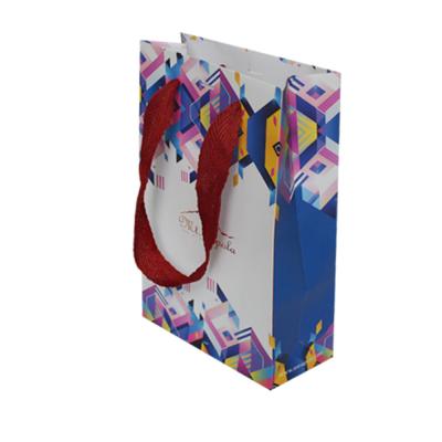 China Colorful Art Recycled Paper Christmas Gift Bags Handmade Printed With Handles for sale