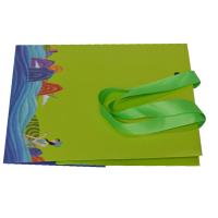 China Christmas Recycled Paper Gift Bags Pantone CMYK Printed Ribbon Handle Bags for sale