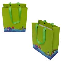 China Christmas Recycled Paper Gift Bags Pantone CMYK Printed Ribbon Handle Bags for sale