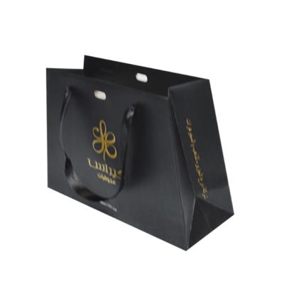 China Art Paper Personalized Goodie Bags Printing Rectangle Ribbon Handle Paper Bags for sale