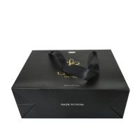 China Art Paper Personalized Goodie Bags Printing Rectangle Ribbon Handle Paper Bags for sale