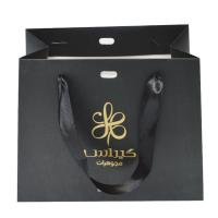 China Art Paper Personalized Goodie Bags Printing Rectangle Ribbon Handle Paper Bags for sale