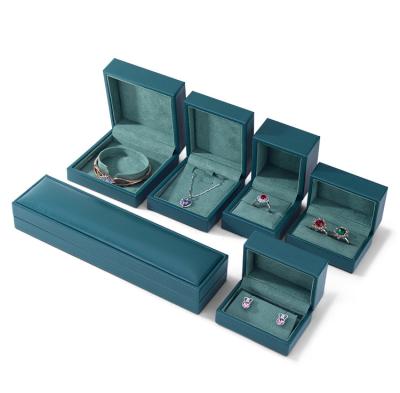 China High-End Custom Pu Leather Jewelry Box Plastic Jewelry Gift Box Ring Bracelet Necklace Jewelry Case Suede Fabric for sale