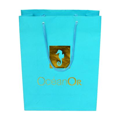 China Blue Recycled Paper Gift Bags String Handle Kraft Paper Shopping Bags for sale