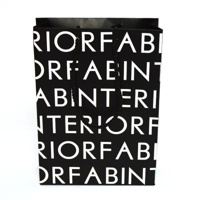 China Rectangle Kraft Recycled Paper Gift Bags Black With Twisted Handles for sale