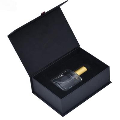 China Perfume Cardboard Magnetic Closure Gift Box Matte Black Foam Insert For Wine Bottles for sale