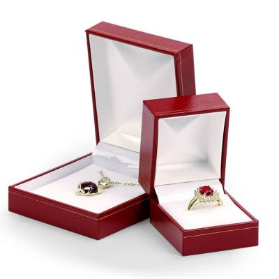 China Leatherette Paper Plastic Gift Box With Gold Line Insert White Satin Velvet Ring Display Box for sale