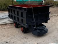 China Side-dumping type Mine CAR Side Dump Mine Car Self-Unloading Mining Cart Traction Locomotive Ore Transport Curved Rail Pull Rod Side Door Unload Mine Loading Equipment Mine Car Ore for sale