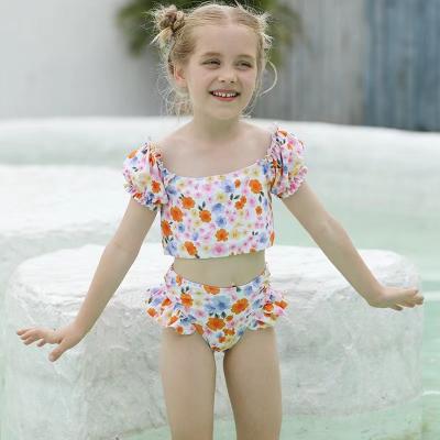 China Small Girls' Swimsuit Split White Printed Two Pieces Girl Swimsuit Lace Decoration Swimsuit for sale