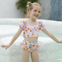 China Small Girls' Swimsuit Split White Printed Two Pieces Girl Swimsuit Lace Decoration Swimsuit for sale