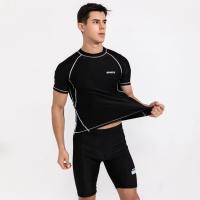 China Simple Two Piece Mens Swimsuit Short Sleeved Male Swimming Costume for sale