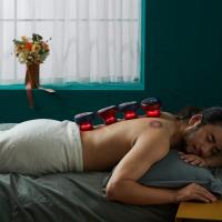 China Fitdash TENS Vacuum Cupping Therapy Machine Electric Heat Cupping Massager for Body for sale