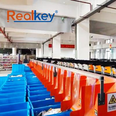 China Reliable Performance Tilt Tray Sorter Low Energy Consumption 7200-10800p/H Capacity for sale