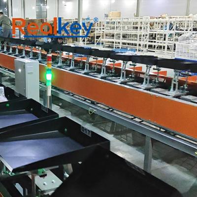 China Automated Classification Tilt Tray Package Sorting Machine Automatic Identification System for sale