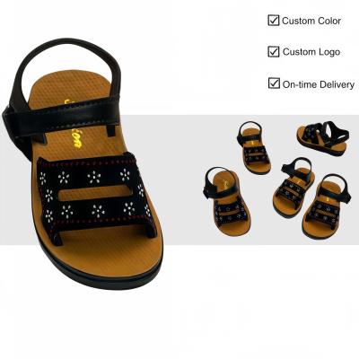 China PVC Kids Sandals with Hollow Floral Rhinestone Design, Non-slip Wear-resistant Outdoor Beach Shoes for Children for sale