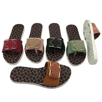 China PVC Women Slides with Clover Metal Buckle Decoration for sale