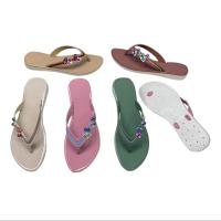 China PVC Women Beach Thongs With Bell Charm Accent And Checkered Embossed Design for sale