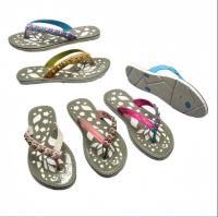 China PVC Women Ethnic Braided Bead Strap Thongs With Floral Cutout Sole And Geometric Traction for sale