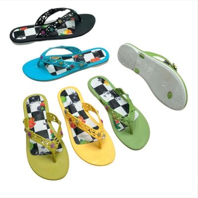 China PVC Women Checkerboard Fruit Print Thongs With Hollow Floral Strap And Rhinestone Accents for sale