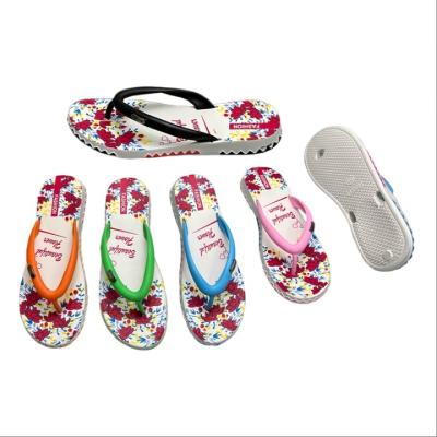 China EVA Women Floral Print Flip Flops With Two-tone Strap And Serrated Edge for sale
