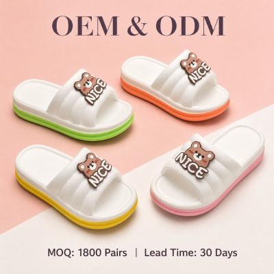 China EVA Kids Platform Slides, Cute Bear Thick Sole Wholesale Slippers for sale