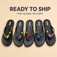 China Honeycomb Outsole Flip Flops with Flower Print Strap | Source Factory Supply for sale