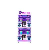 China Customized Four Player Electric Games Arcade Claw Crane Machine for Amusement Game Center for sale