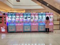 China Mini 116 USD Claw Machine with Metal Acrylic Plastic Construction Table Top Design for sale