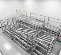 China Powder Coated Finish Roller Conveyor Rack Shelf Featuring 50mm Roller Spacing Suitable for Heavy Load Industrial Storage for sale