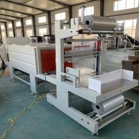 China PLC Control Shrink Wrapping Machine 20-40 PPM Touch Screen PVC POF PE Packaging for sale