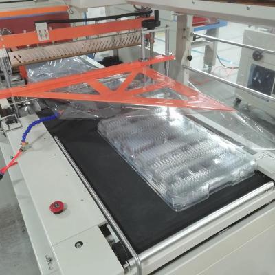 China Automatic Shrink Wrapping Packaging Machine 220V 380V 20-40 Packs Per Minute Heat Sealing for sale