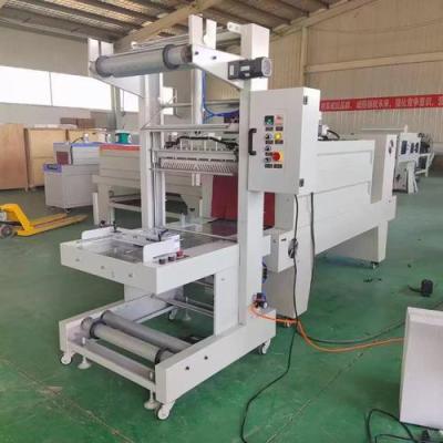 China PLC Control Shrink Wrapping Machine 20-40 PPM Touch Screen PVC POF PE Packaging for sale